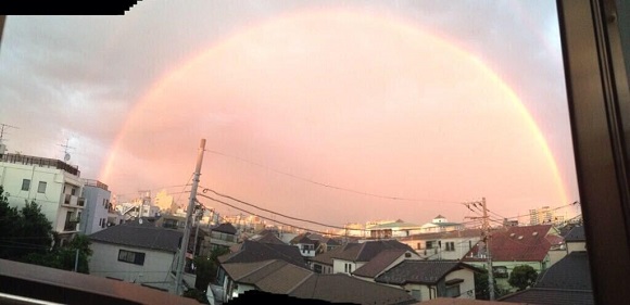 Perfect rainbow appears over Tokyo like an interdimensional portal, no ...